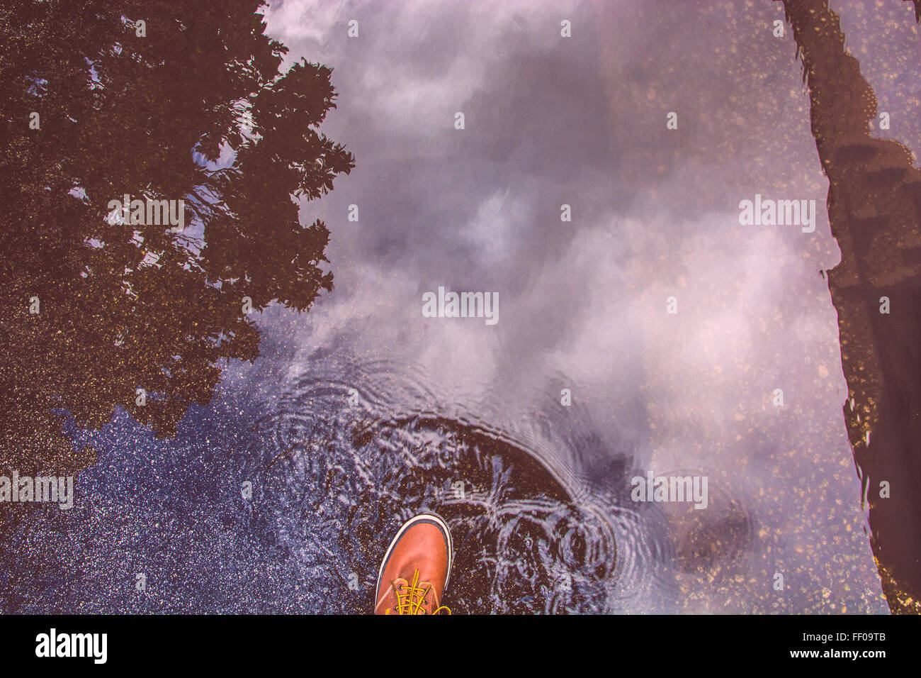 Splash in the puddle hi-res stock photography and images - Alamy