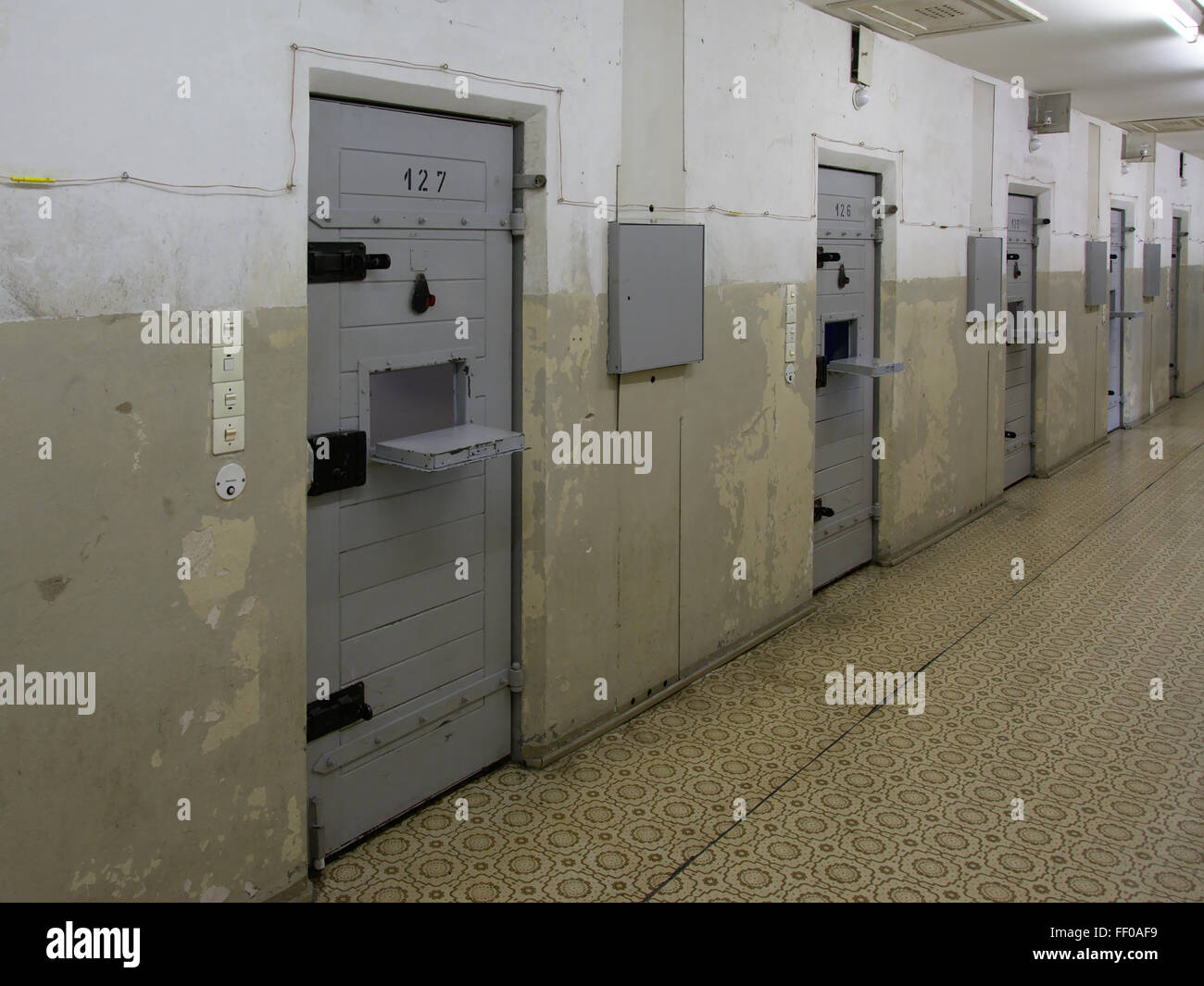 Hallway with cell doors in Stasi prison, Berlin Stock Photo - Alamy