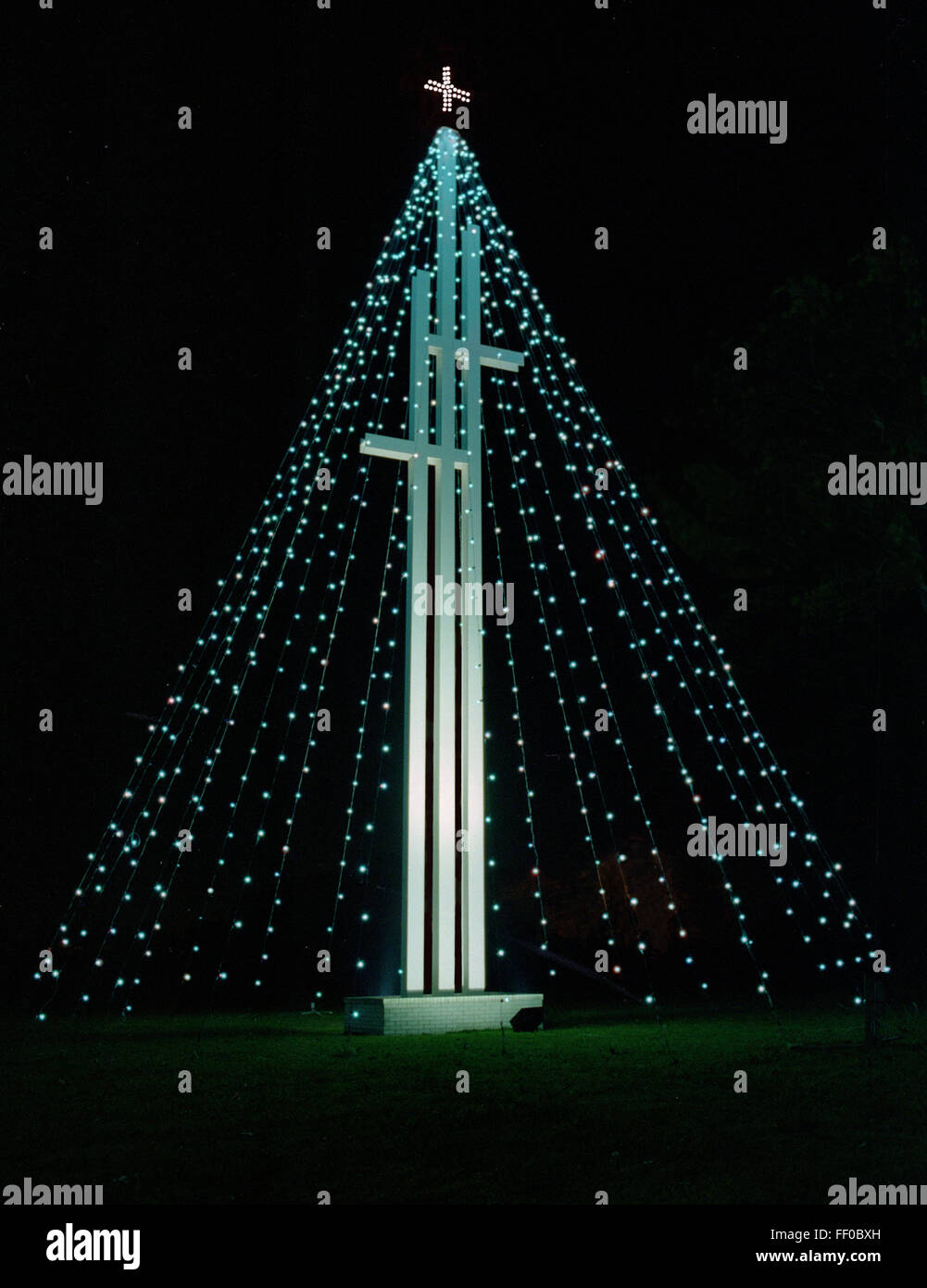Christmas Lights On Three Crosses At Night Stock Photo - Alamy