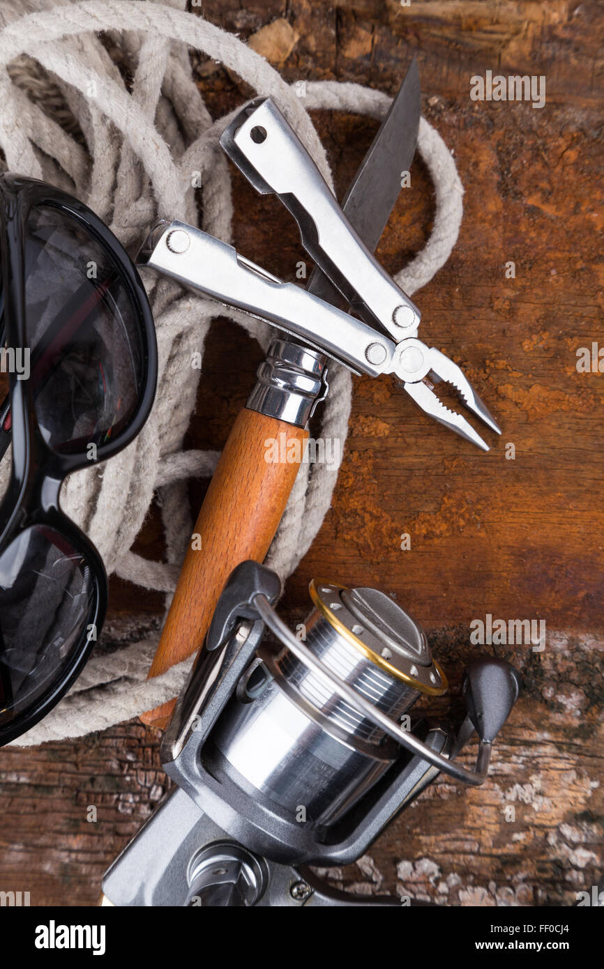 fishing tackles for anglers - swimmers, plummes and tools on wooden ...