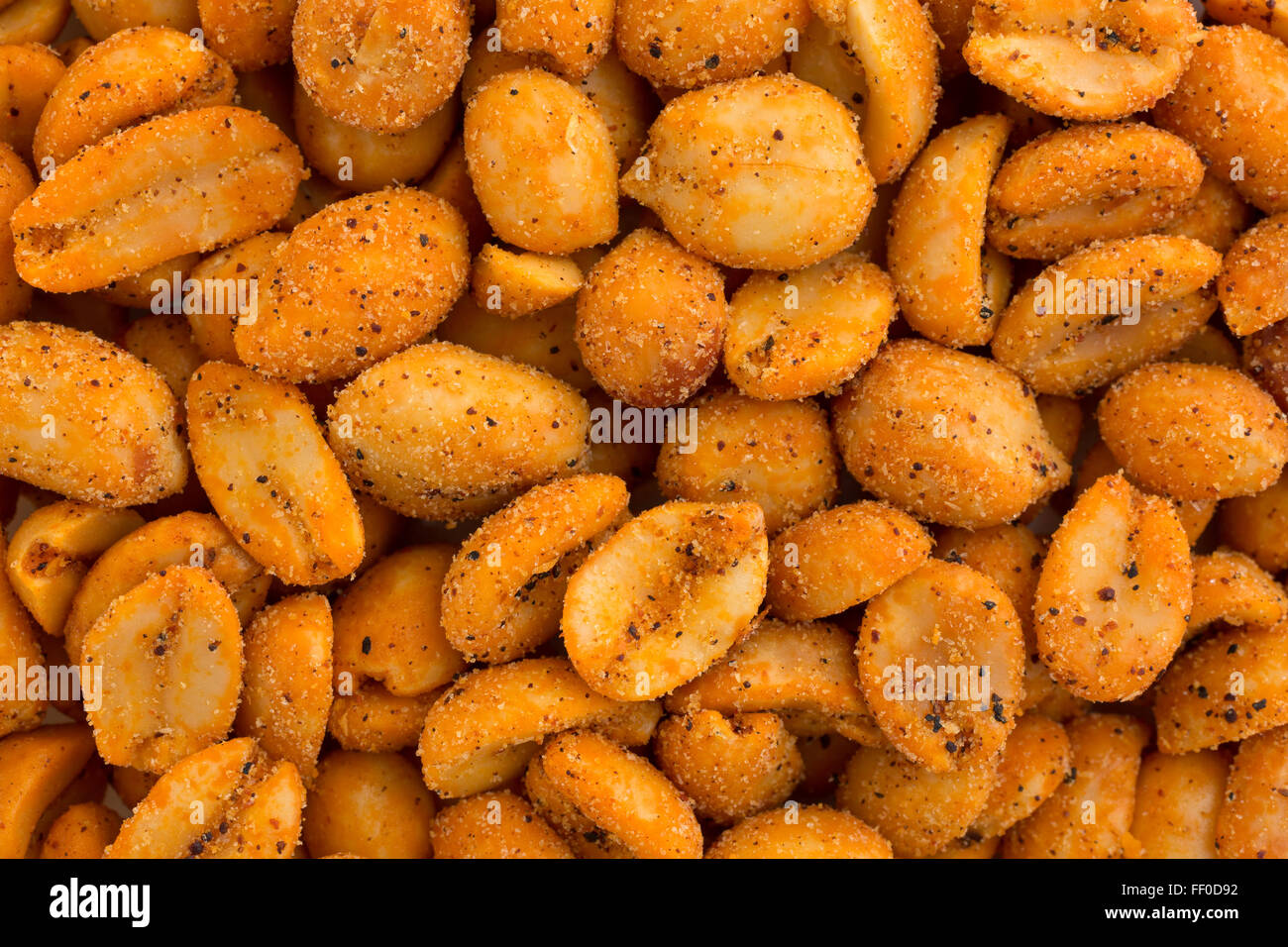 Close view of hot and spicy peanuts illuminated with natural light ...