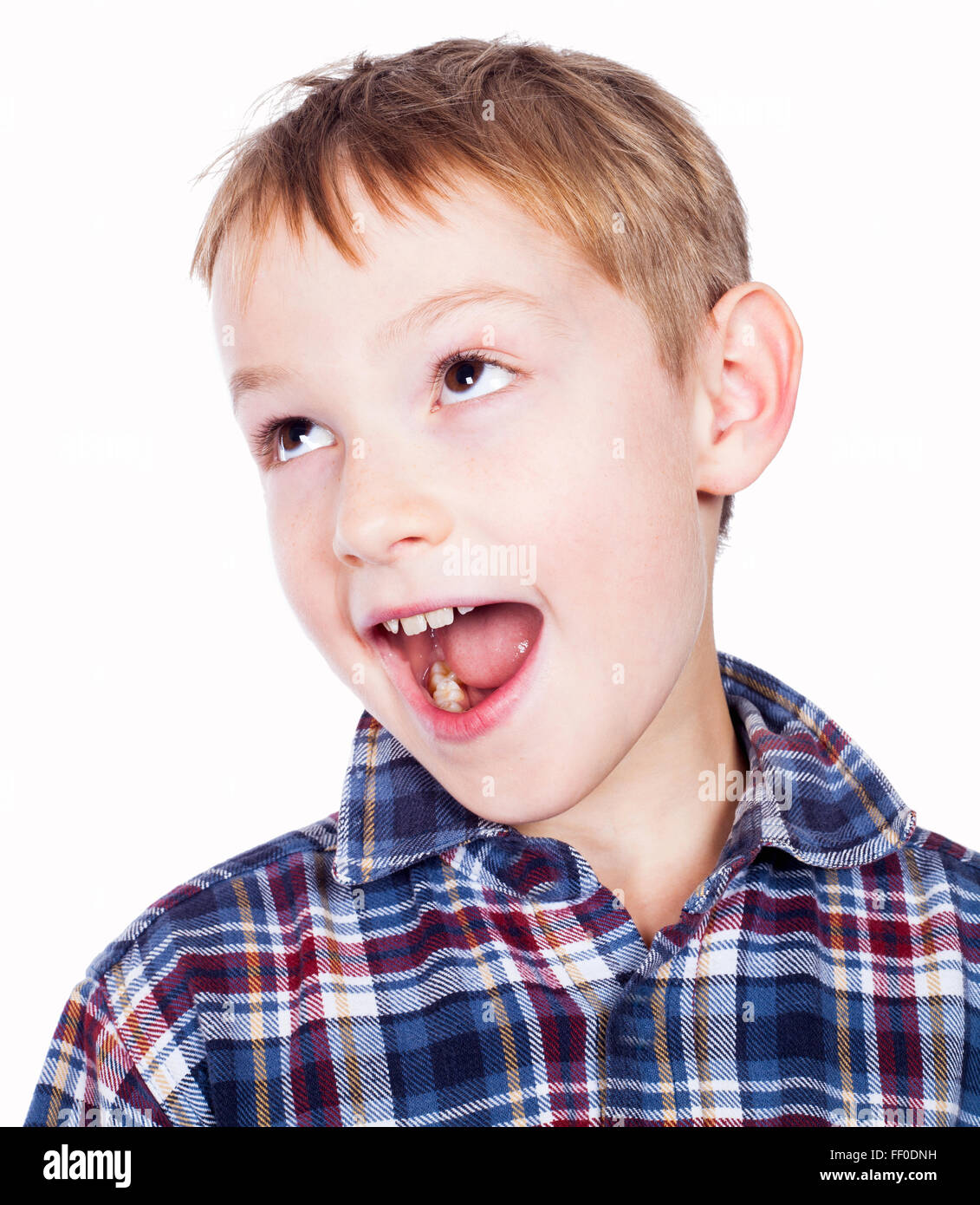 Portrait of boy looking up Stock Photo - Alamy
