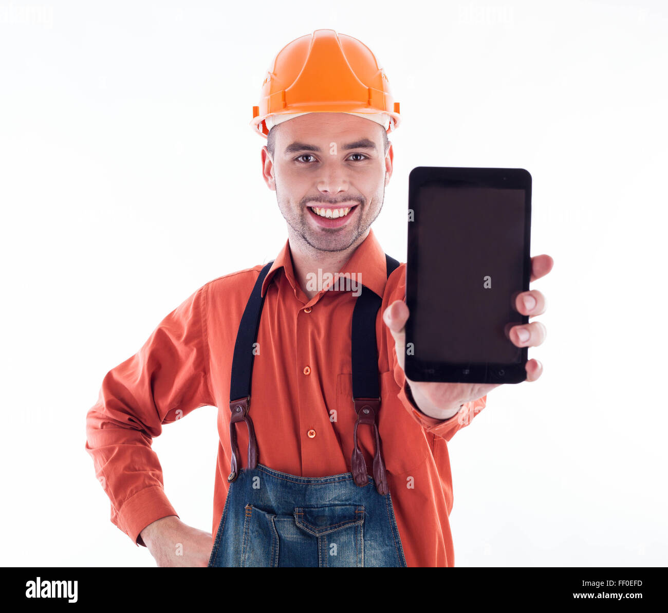 A builder with a tablet Stock Photo - Alamy
