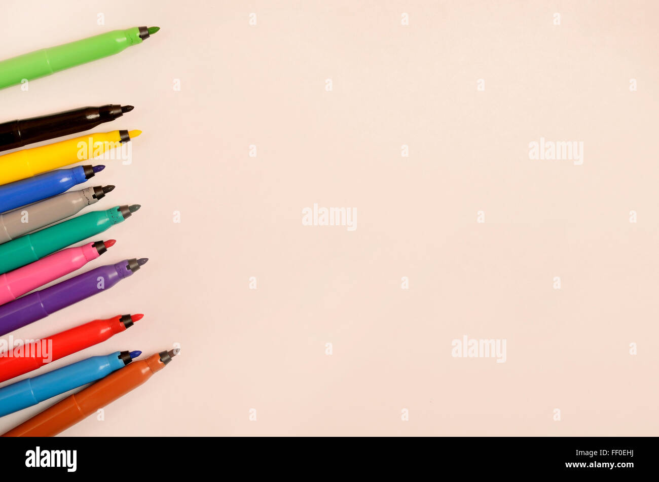 Many colorful marker on white background Stock Photo - Alamy