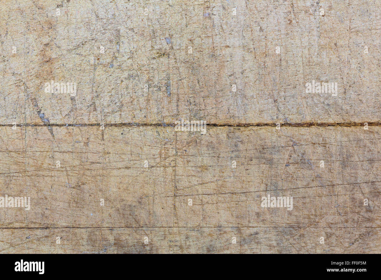 A very close view of a split in an antique table top Stock Photo - Alamy