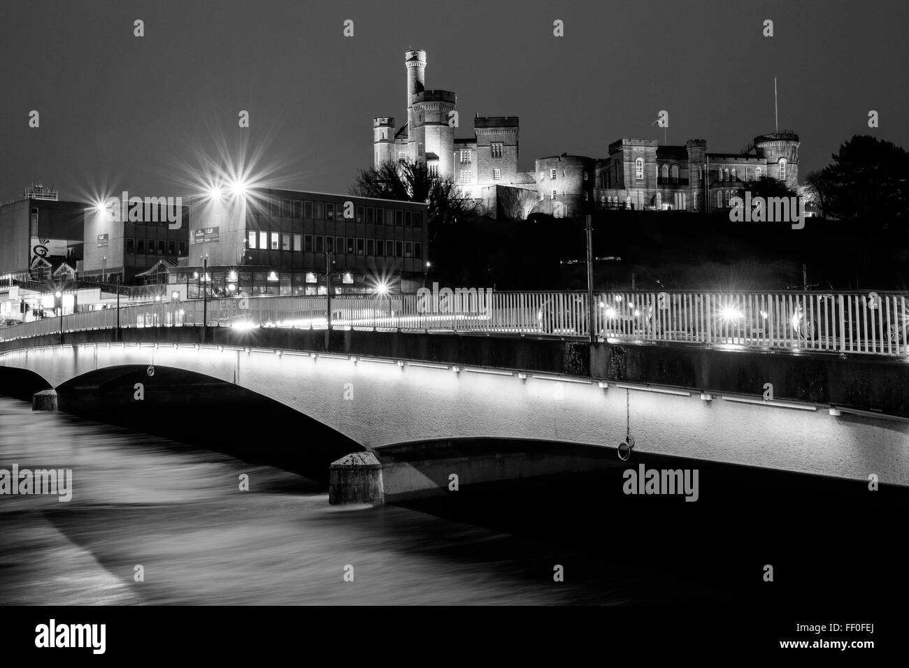 Night black and white scene of Inverness Castle on the bank of the Ness ...