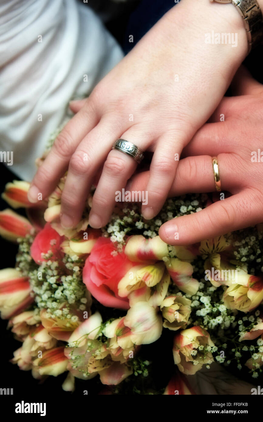 Just married bride and groom with their wedding rings Stock Photo - Alamy
