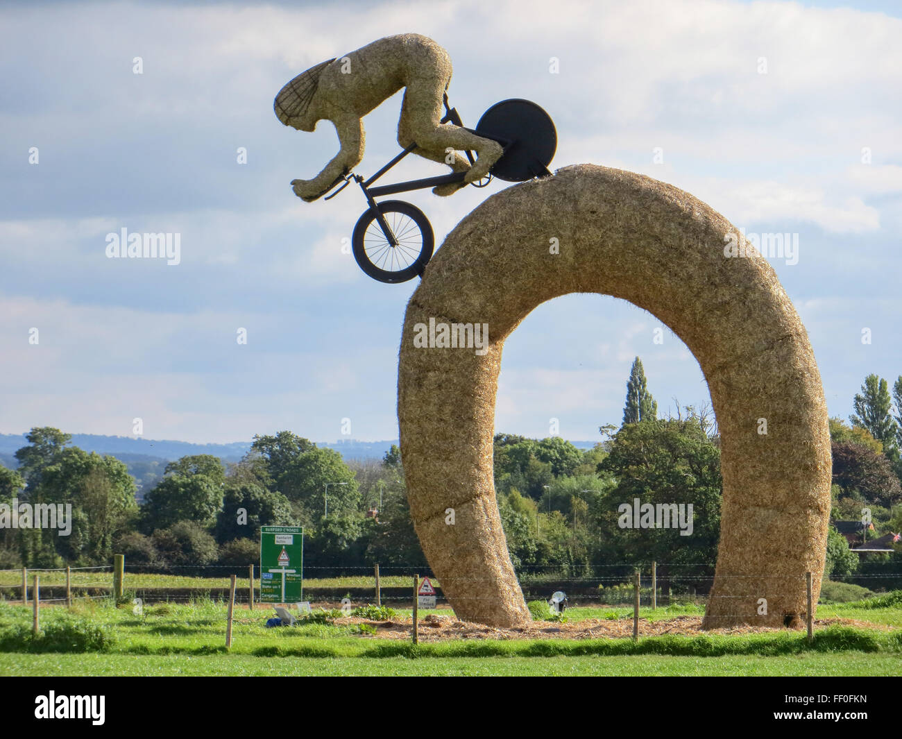 Olympic cyclist straw sculpture at Snugburys Stock Photo - Alamy