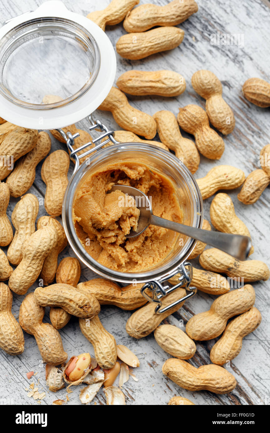 Homemade peanuts butter in a glass jar Stock Photo - Alamy