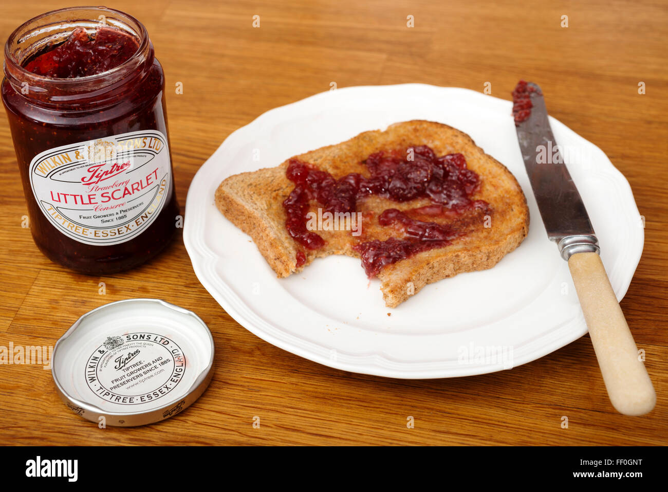 Wilson & Sons Tiptree Little Scarlet strawberry jam on toast Stock ...