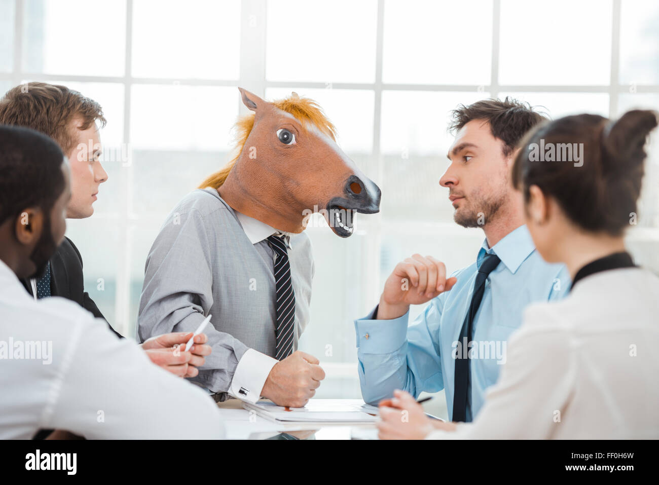 Funny concept for teamwork and knowledge transfer Stock Photo - Alamy