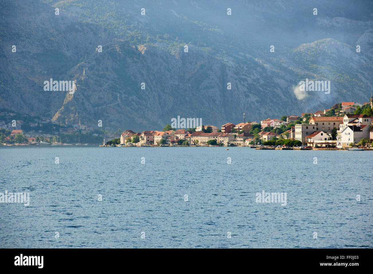 Dobrota,Bay outside Kotor Town,Fortifications snaking up the ...