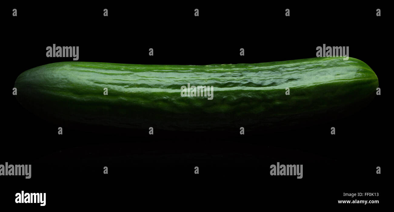 cucumber on a black background Stock Photo - Alamy
