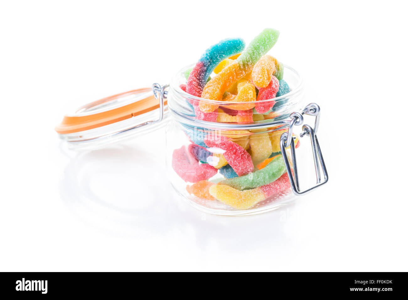 Candies in candy jar on a white background Stock Photo - Alamy