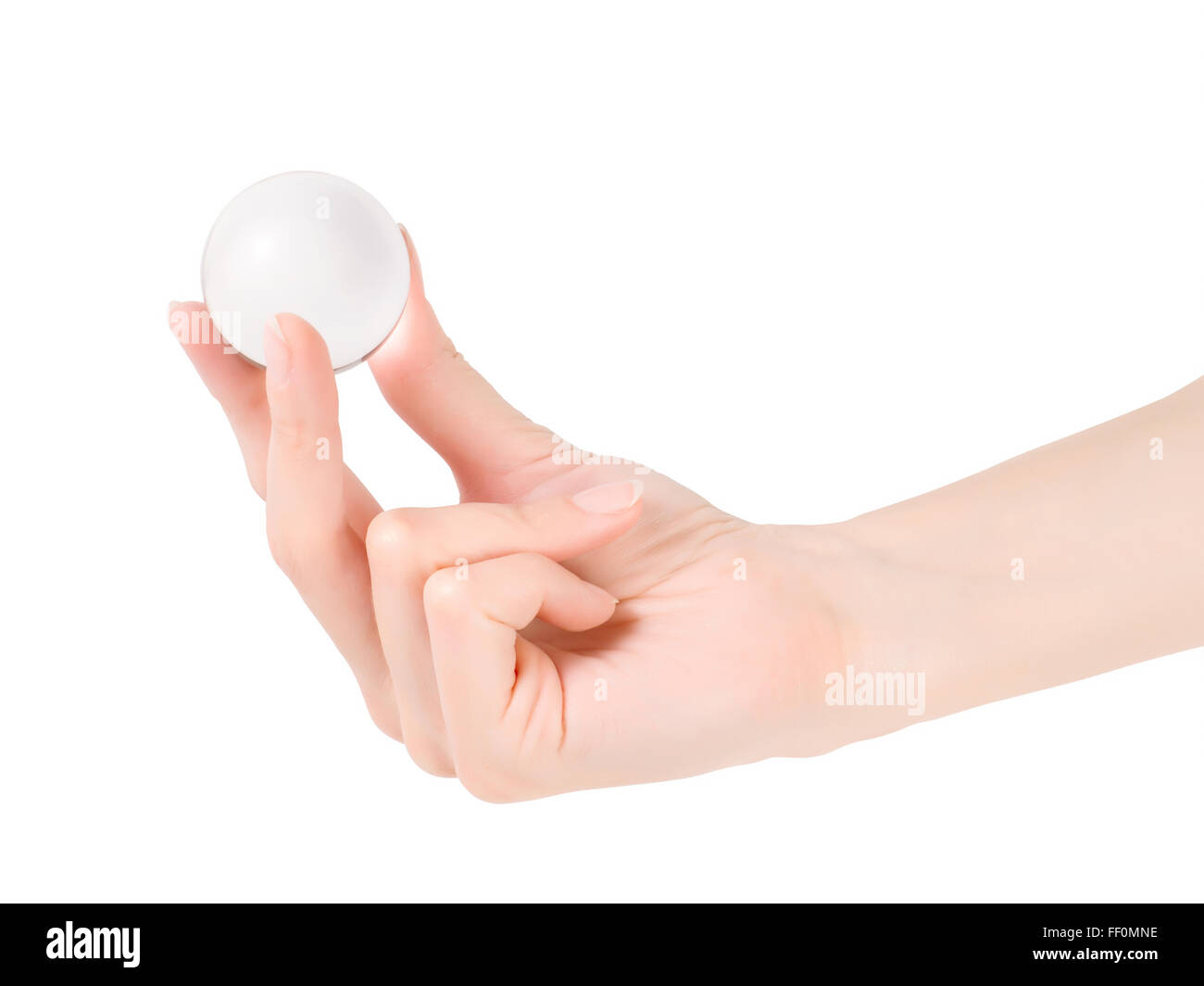 Woman hand with glass ball isolated on white with clipping path Stock ...