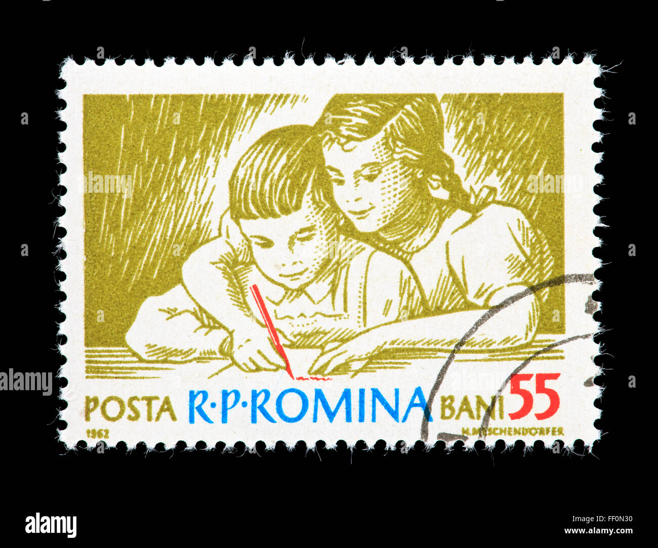 Postage stamp from Romania depicting a boy and girl writing Stock Photo ...