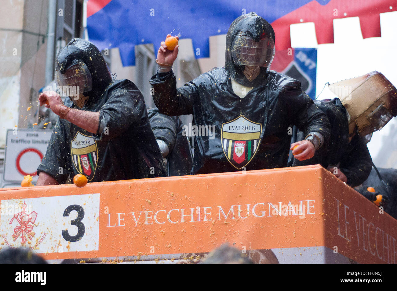 The traditional 'battle of the oranges' held during the Ivrea Carnival ...