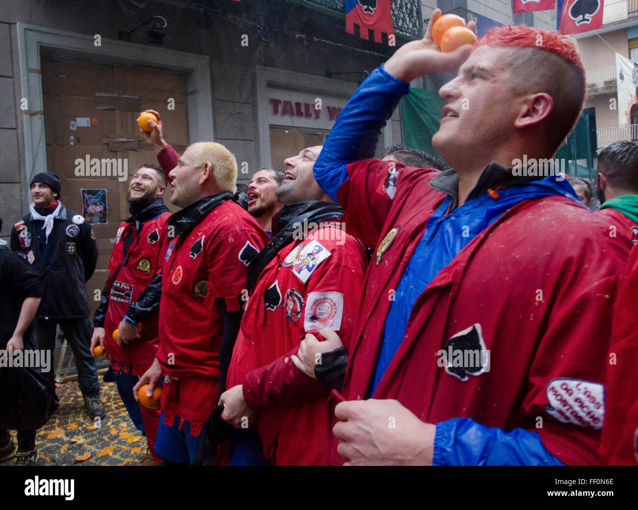 The traditional 'battle of the oranges' held during the Ivrea Carnival ...