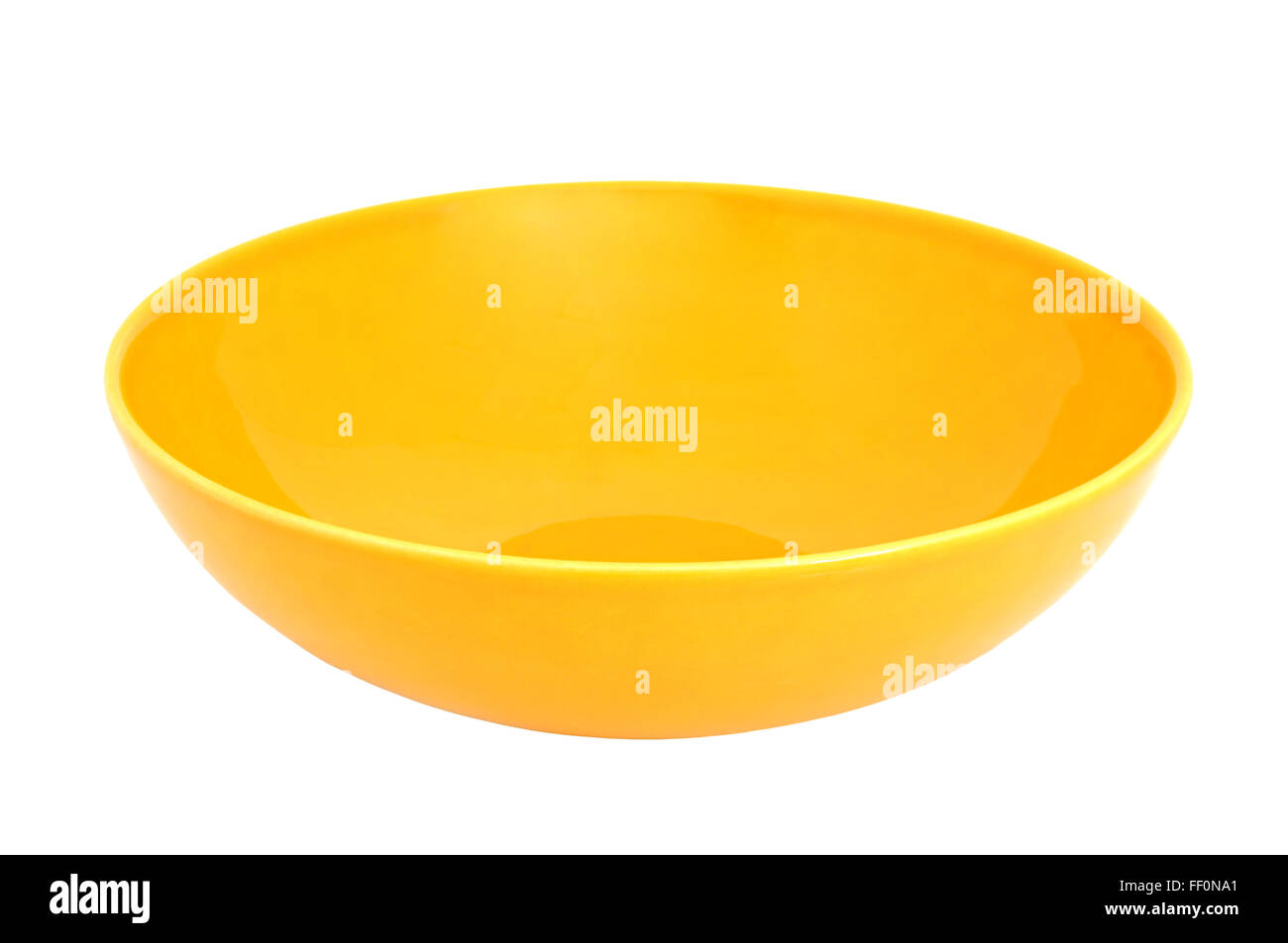Empty yellow plate isolated on a white background Stock Photo - Alamy