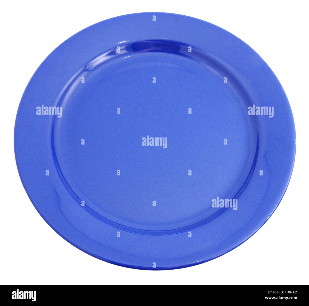 Blue ceramic plate isolated on a white background Stock Photo - Alamy