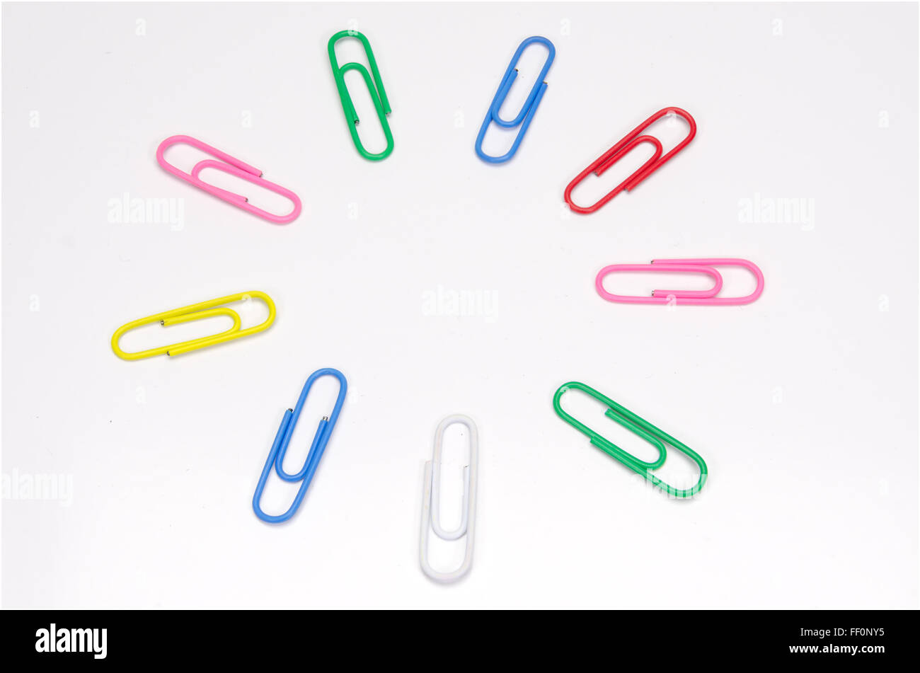 Colorful paper clip isolated on white background Stock Photo - Alamy
