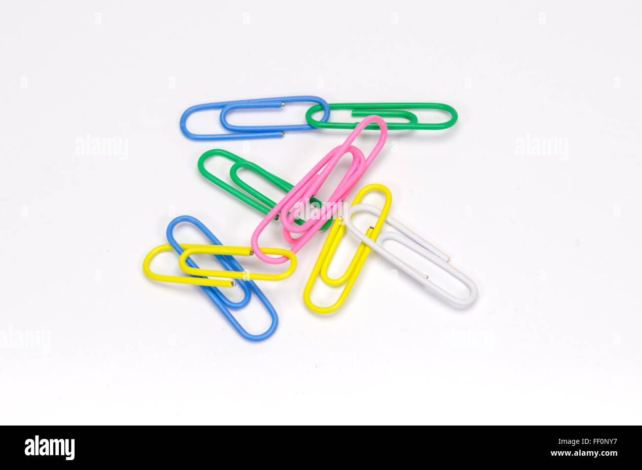 Colorful paper clip isolated on white background Stock Photo - Alamy