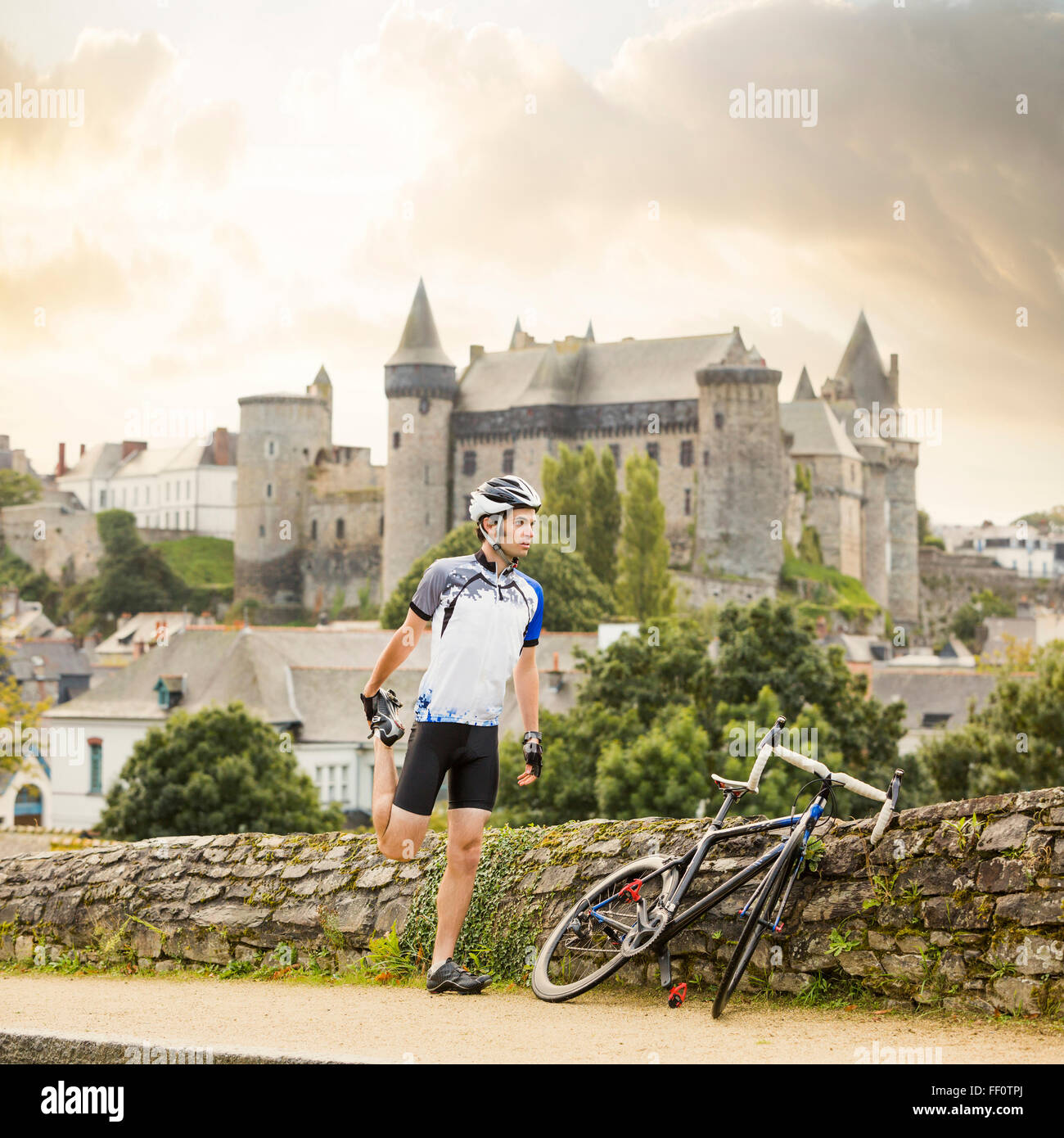 Caucasian cyclist stretching outdoors Stock Photo - Alamy