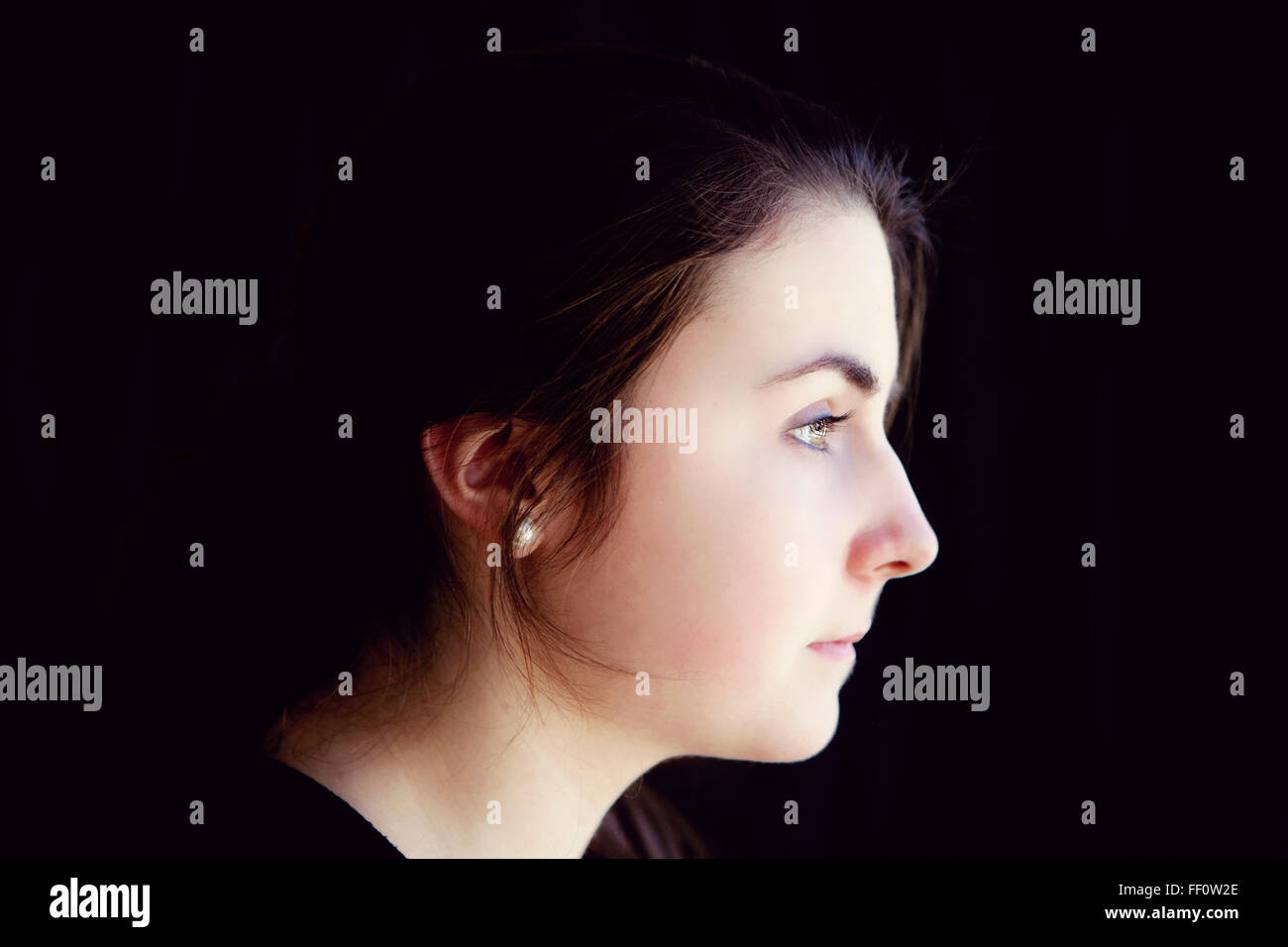 Woman serious profile hi-res stock photography and images - Alamy