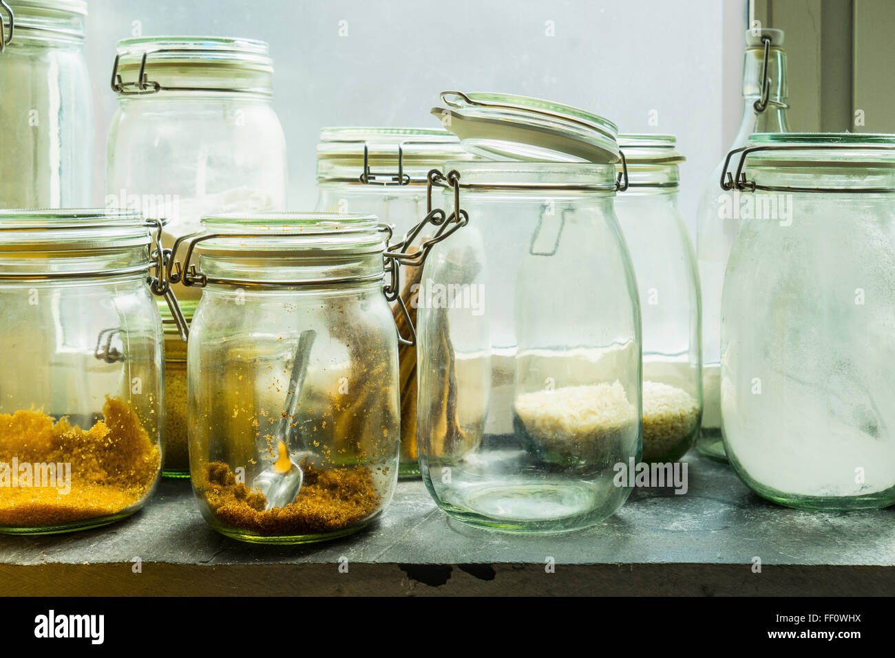 Open jars in windowsill Stock Photo - Alamy
