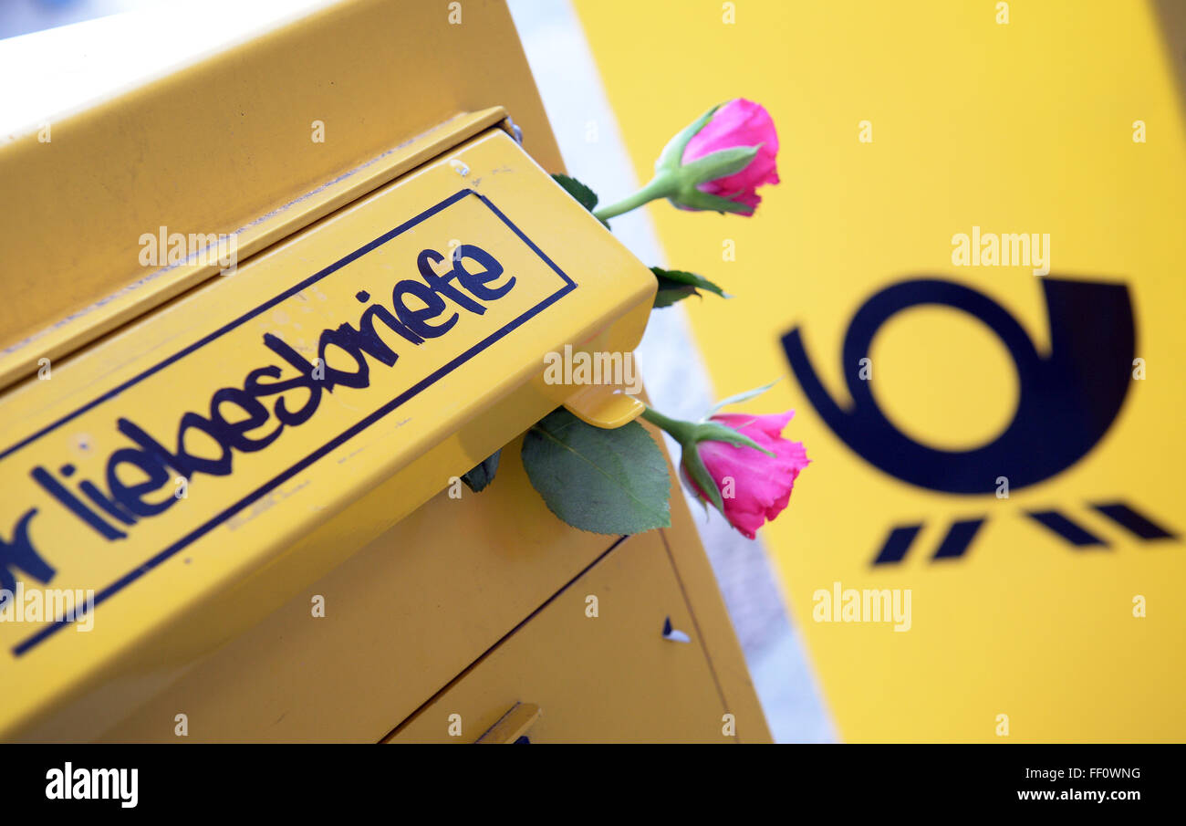 A letter box reading 'Liebesbriefe' (lit. 'Love letters') with roses ...