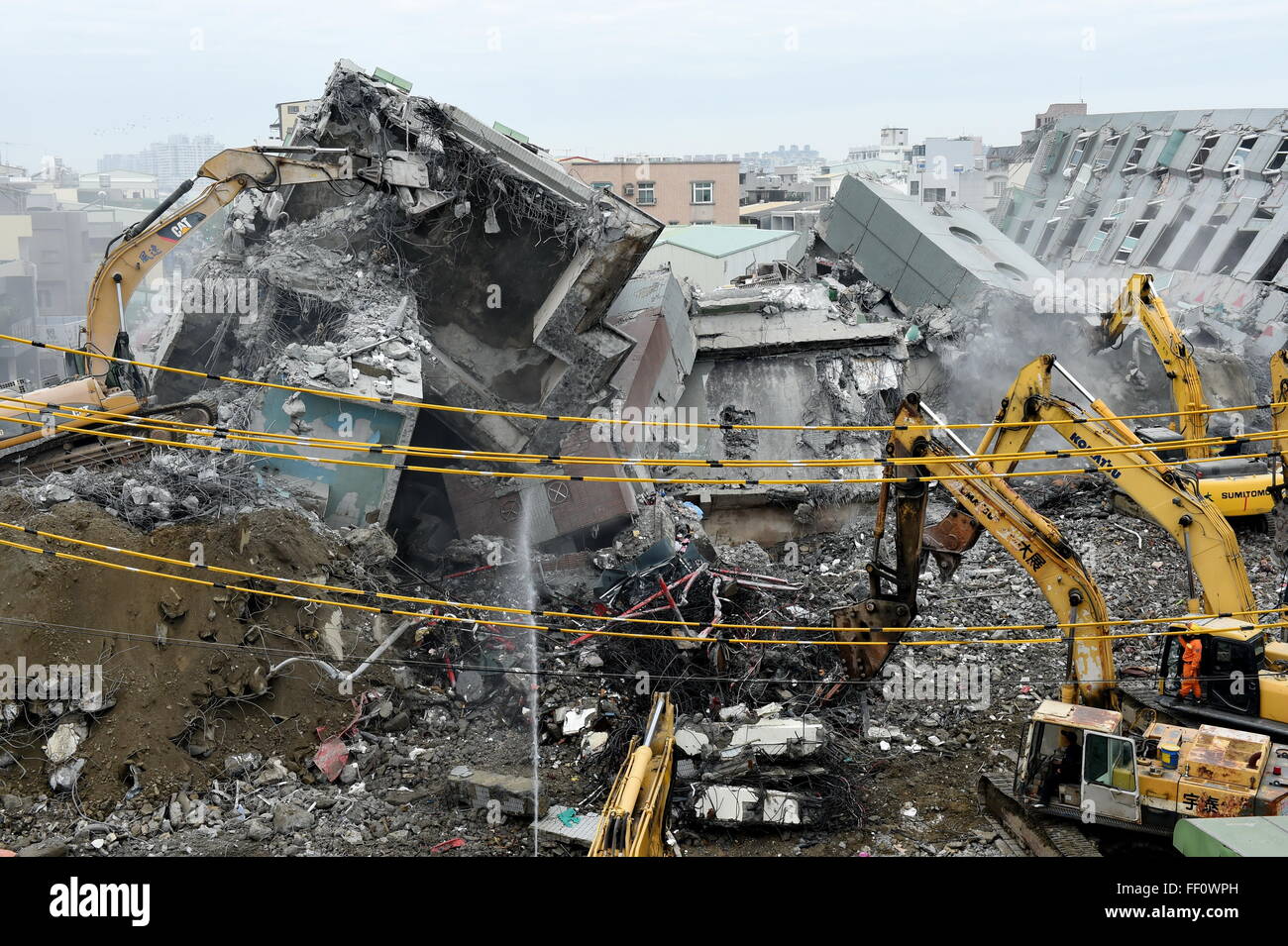 Tainan, China's Taiwan. 10th Feb, 2016. Heavy machines work at the ...