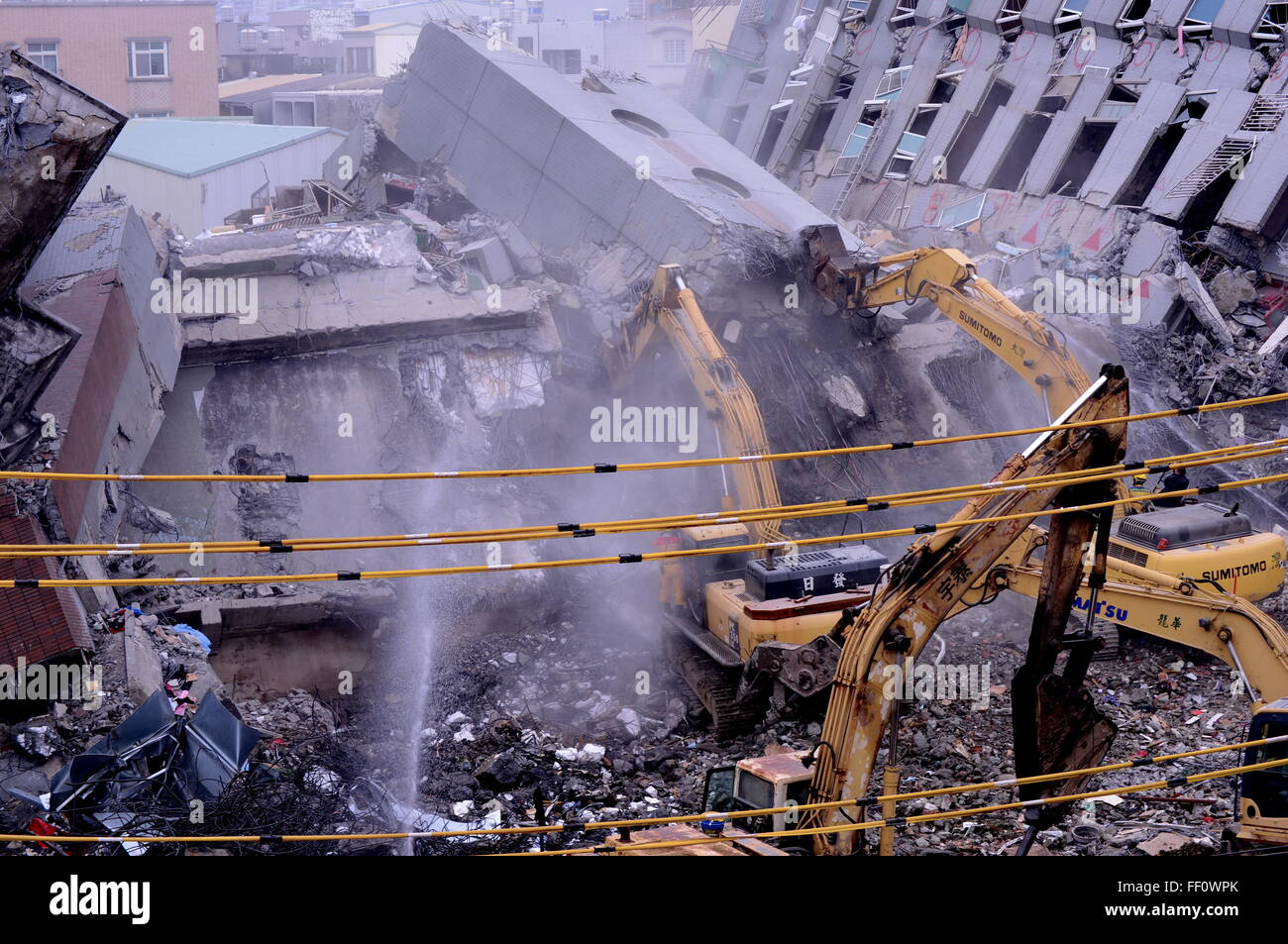 Tainan, China's Taiwan. 10th Feb, 2016. Heavy machines work at the ...
