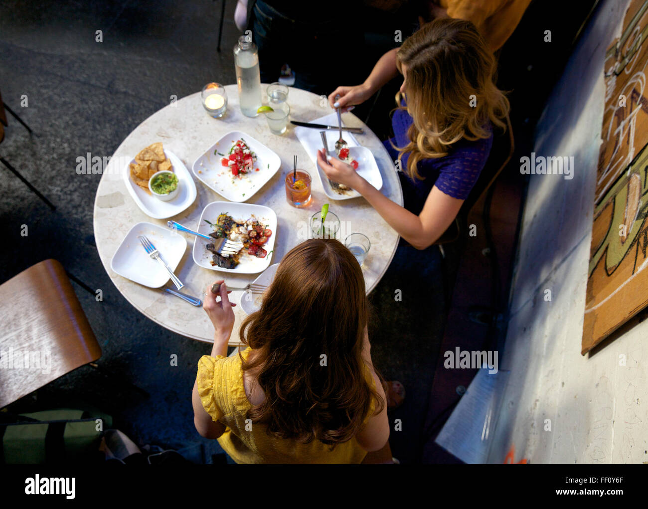 Sharing table restaurant hi-res stock photography and images - Alamy