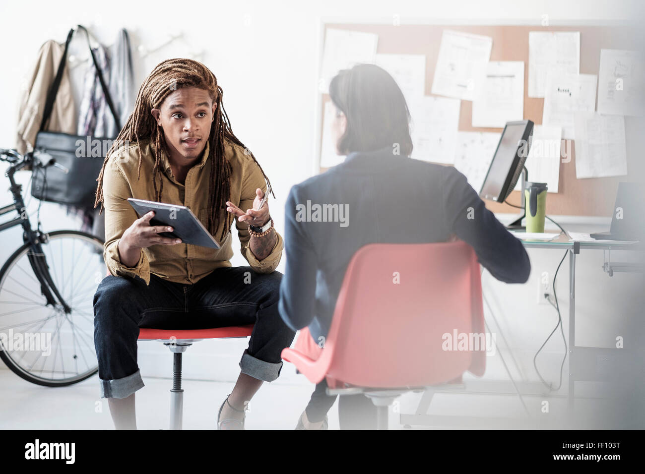 Business people talking in office Stock Photo - Alamy