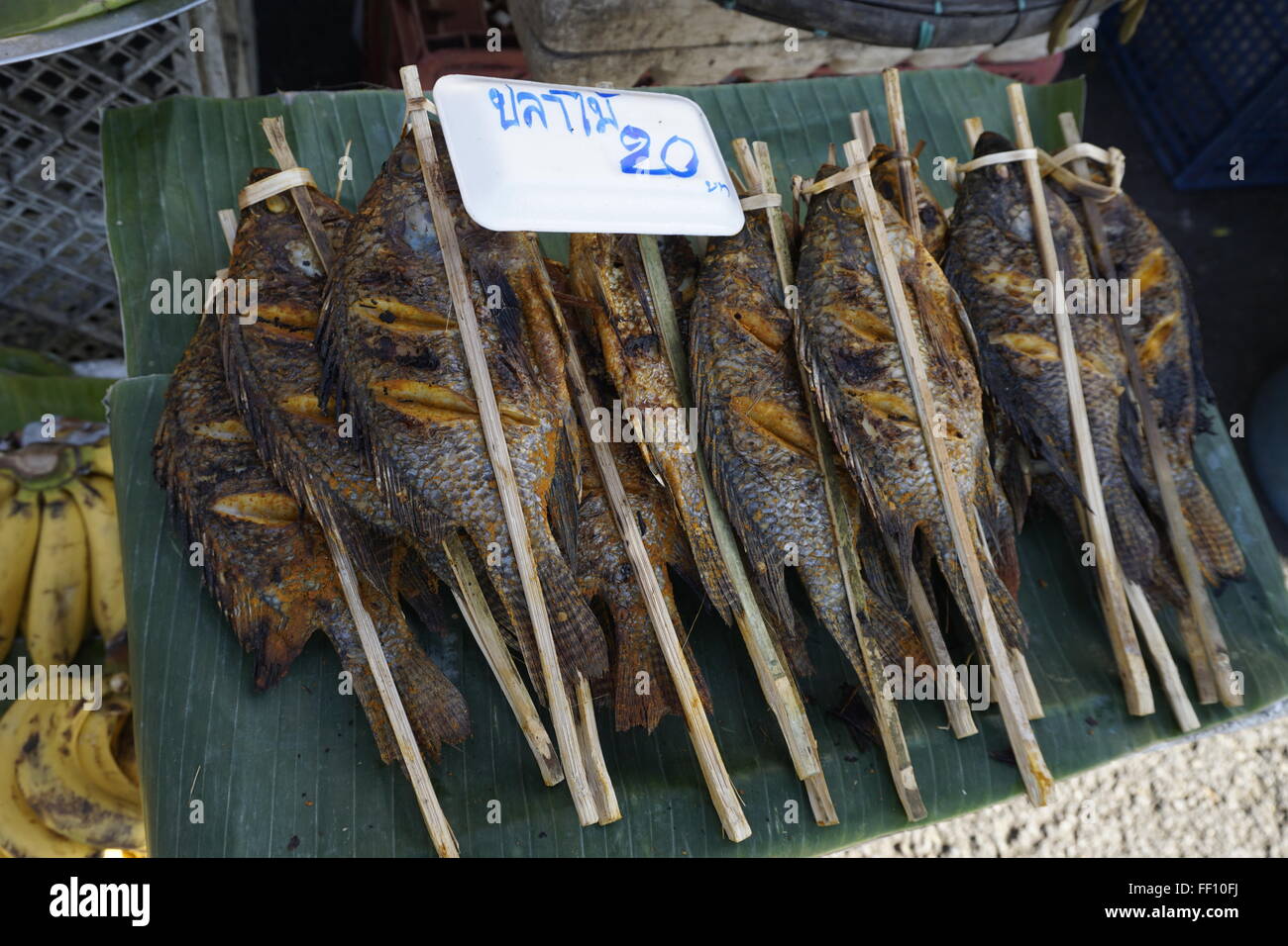 grilled fish on skewer, sold in market in Chiang Mai, Thailand Stock ...