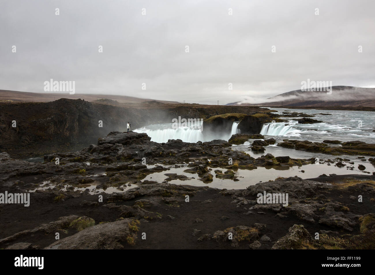 Rock formation cliffs near remote waterfall Stock Photo - Alamy