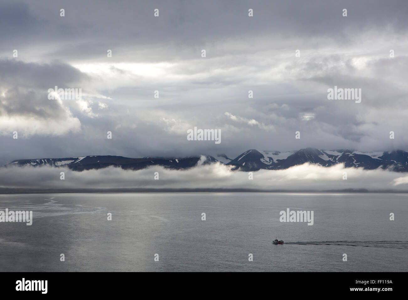 Aerial view of seascape and remote mountains Stock Photo - Alamy