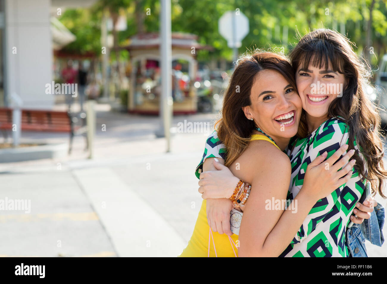 Women hugging 35 years hi-res stock photography and images - Alamy