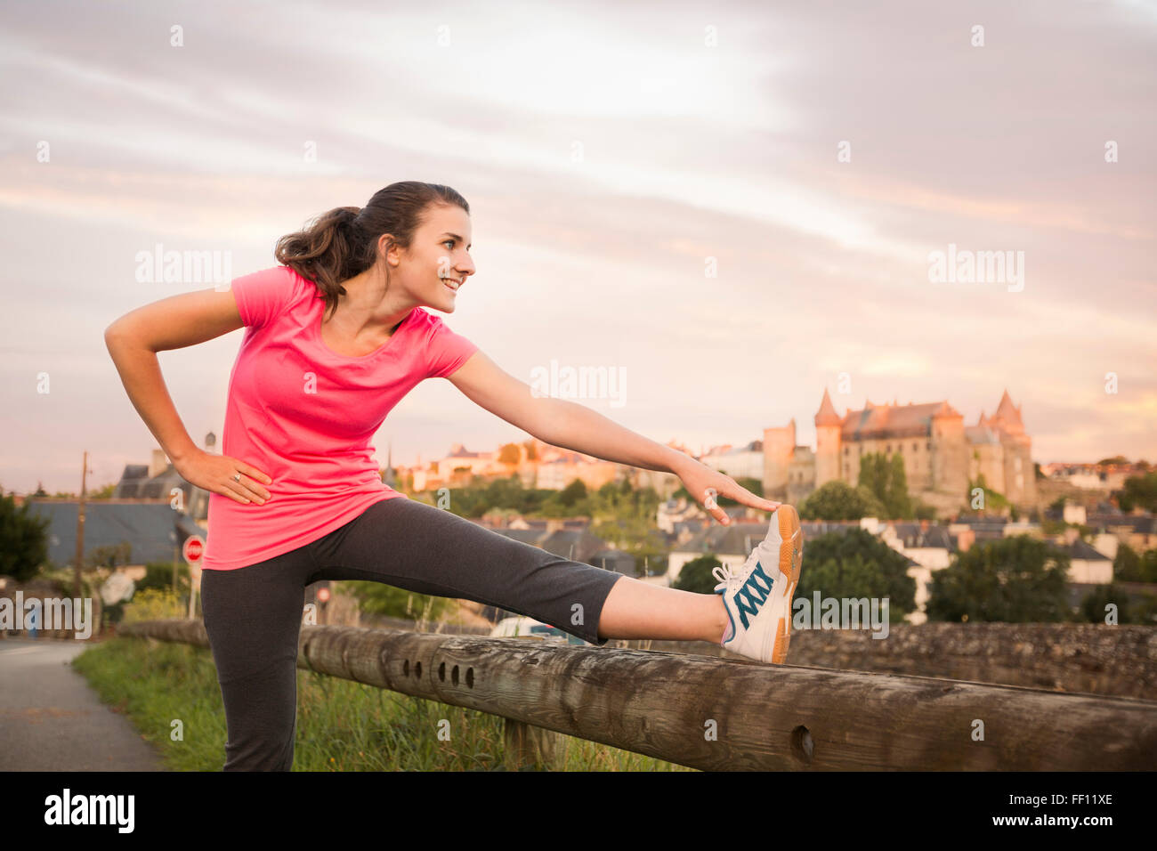 Running stretching woman stretching leg hi-res stock photography and ...