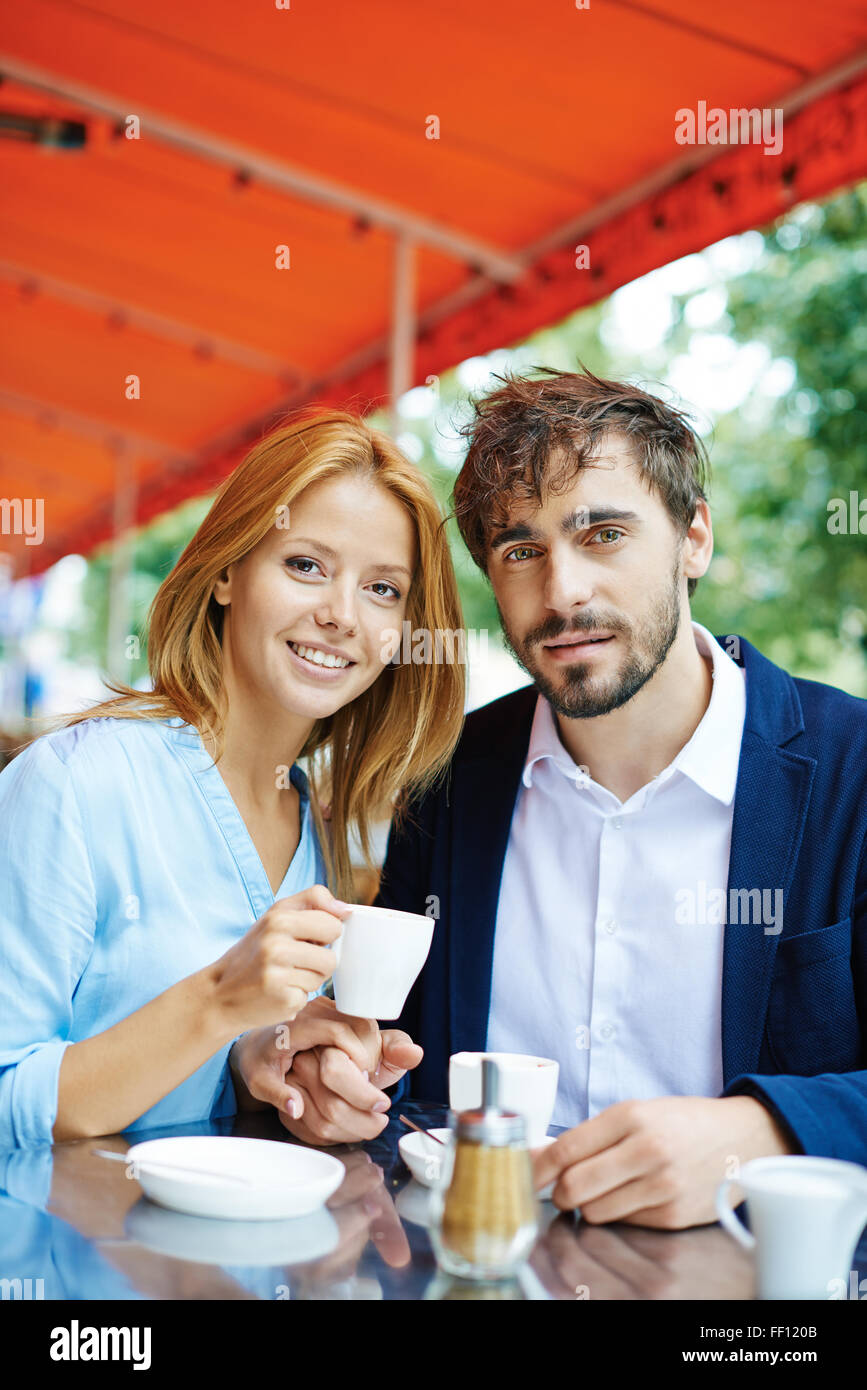 Amorous young couple having tea in the morning Stock Photo - Alamy