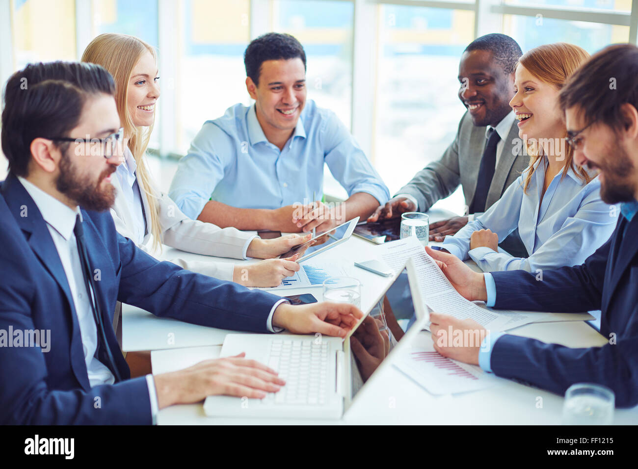 Happy business partners hi-res stock photography and images - Alamy