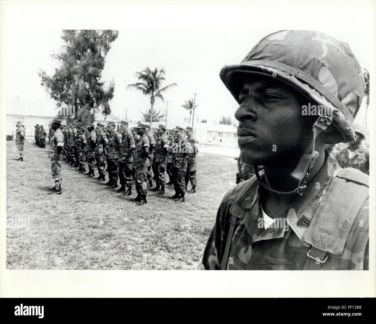 1980 - A group of marines from up before moving into the security area ...