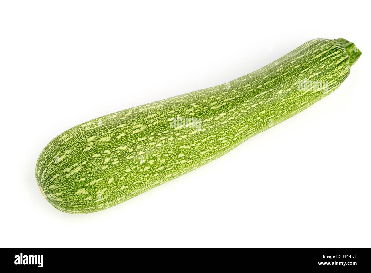 Single ripe green zucchini over white background Stock Photo - Alamy