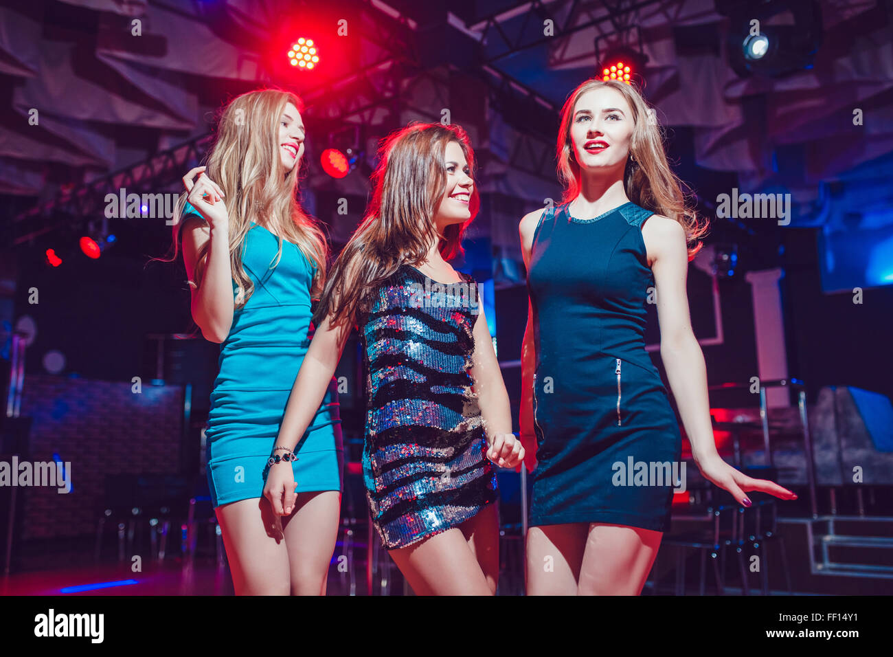Beautiful girls having fun at a party in nightclub Stock Photo - Alamy