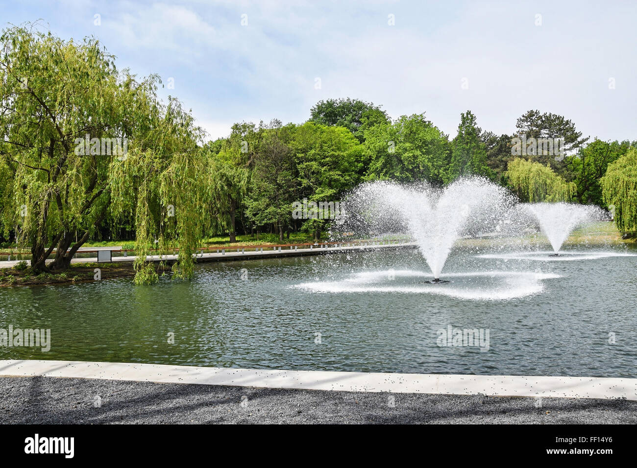 Fountain in the park Stock Photo - Alamy