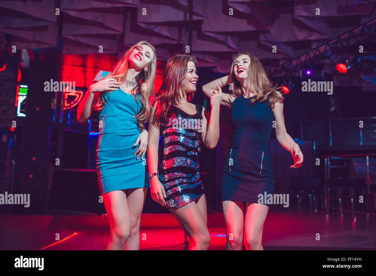 Beautiful girls having fun at a party in nightclub Stock Photo - Alamy