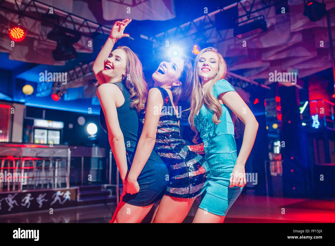 Beautiful girls having fun at a party in nightclub Stock Photo - Alamy