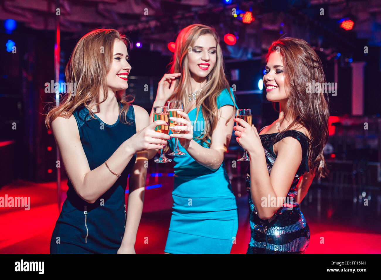 Beautiful girls having fun at a party in nightclub Stock Photo - Alamy
