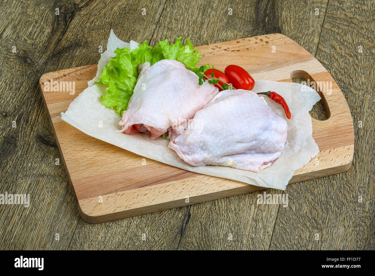 Raw chicken legs meat with herbs and spices ready for cooking Stock ...
