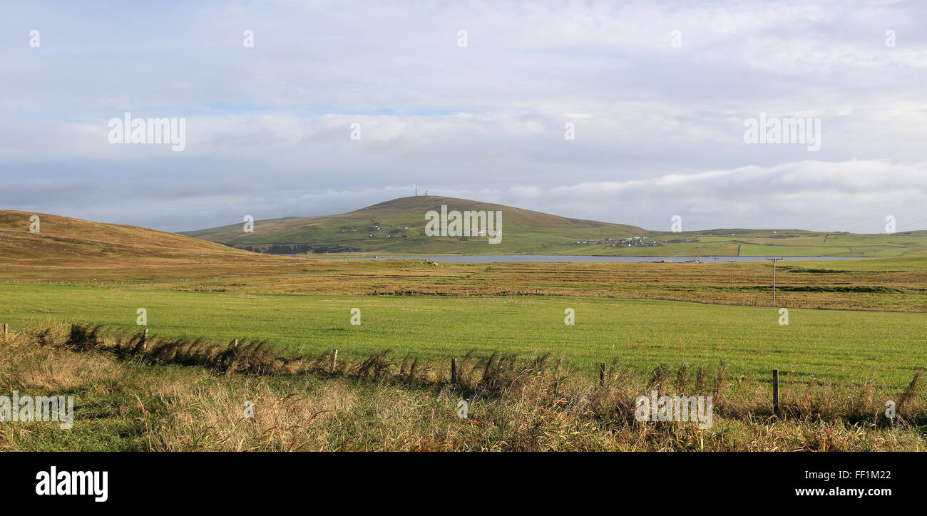 View across farmland to Loch Spiggie and Scousburgh, Mainland, Shetland ...